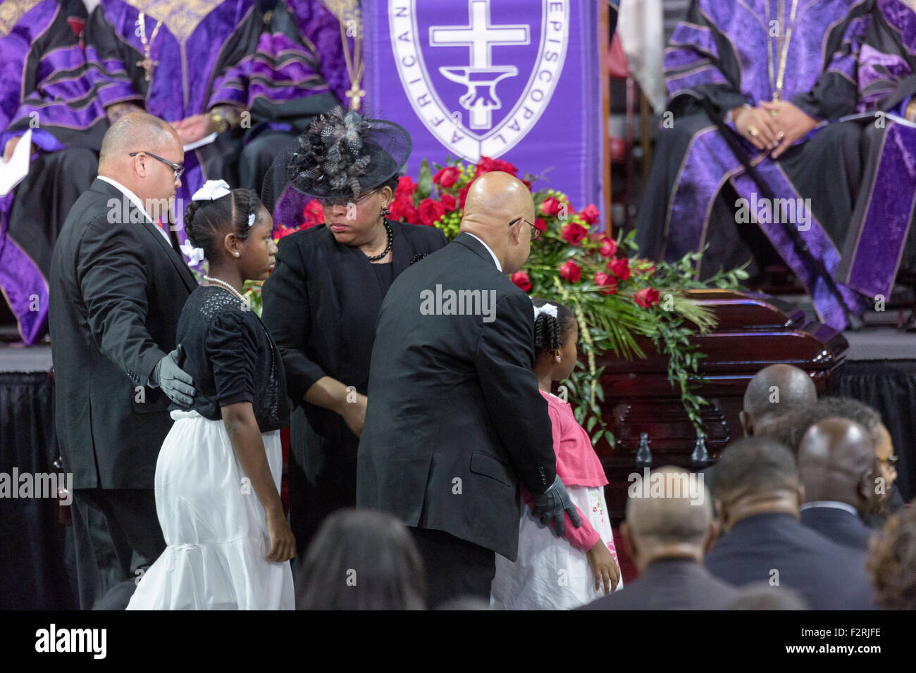 Jennifer Pinckney, center, and daughters Eliana, left, and Malana, wife ...