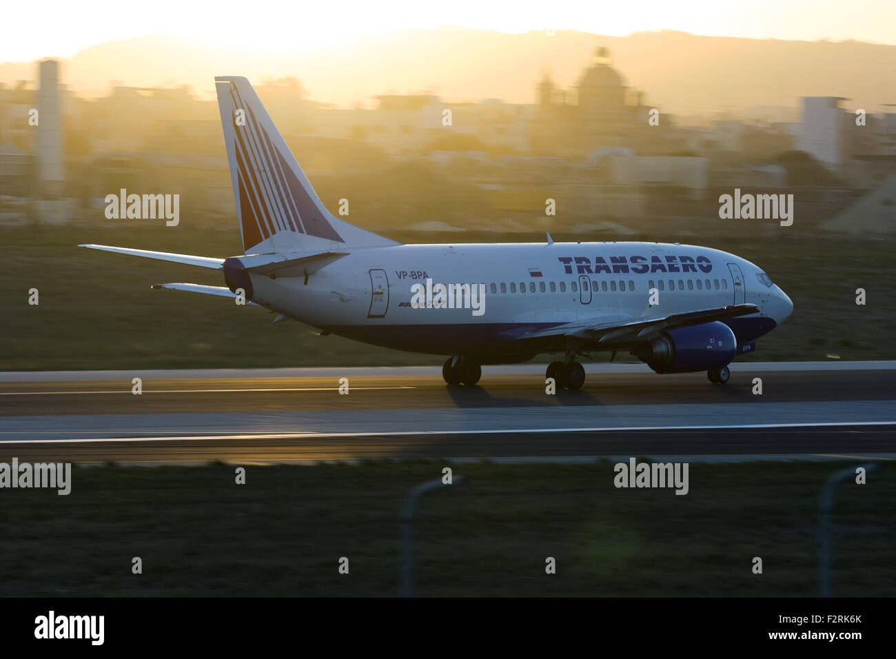 Transaero Boeing B737-600 taking off during sunset Stock Photo - Alamy