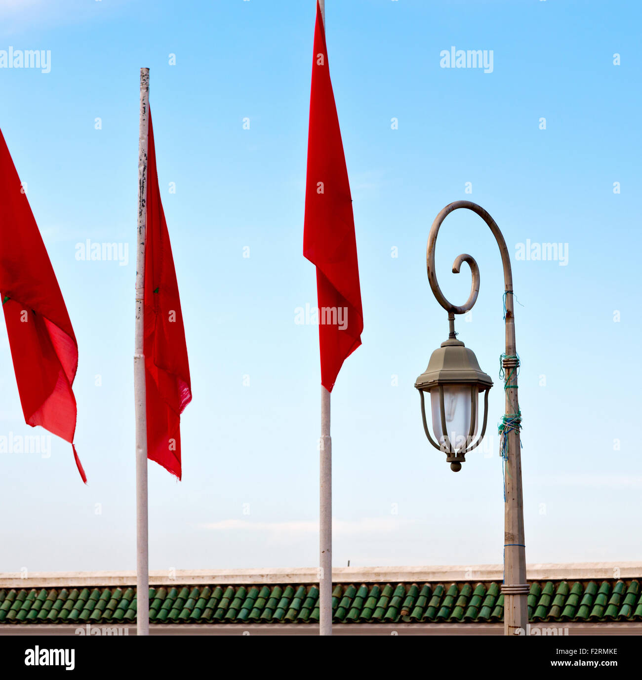 waving flag in the blue sky tunisia colour and wave battlements Stock ...