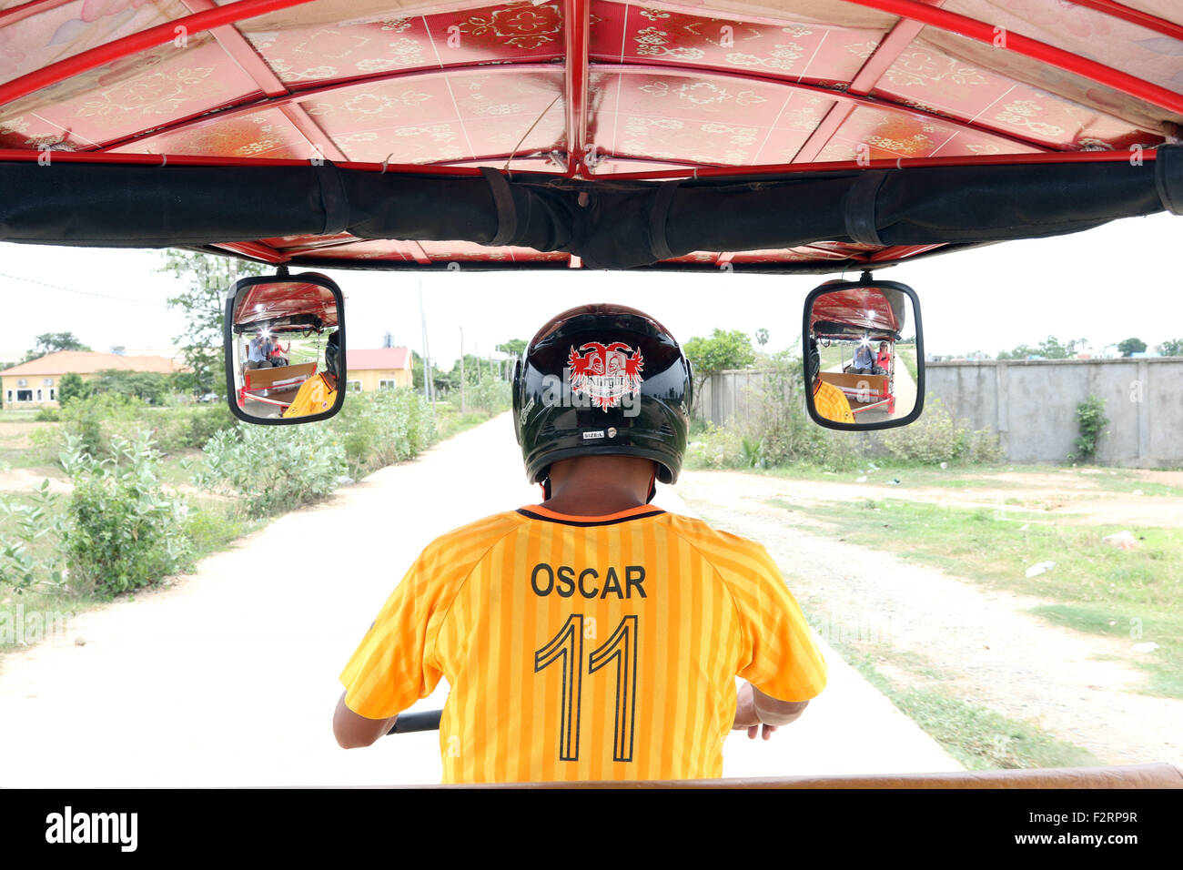 Tuktuk driver with Chelsea shirt Oscar player Stock Photo - Alamy