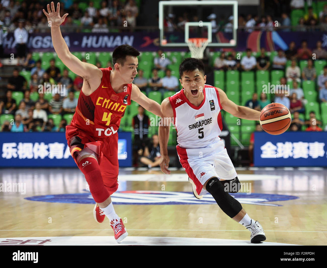 Changsha, China's Hunan Province. 23rd Sep, 2015. Zhao Jiwei(L) of ...