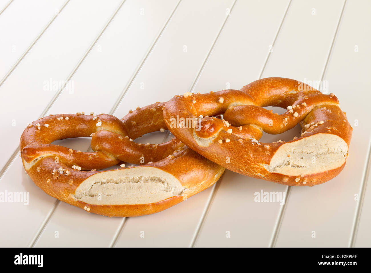 A pretzel is a type of baked bread product made from dough most ...