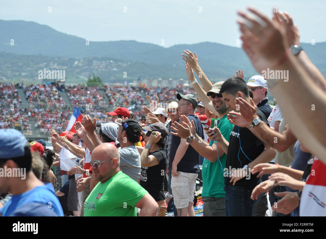 Spectators clapping at Spanish Grand Prix Stock Photo - Alamy