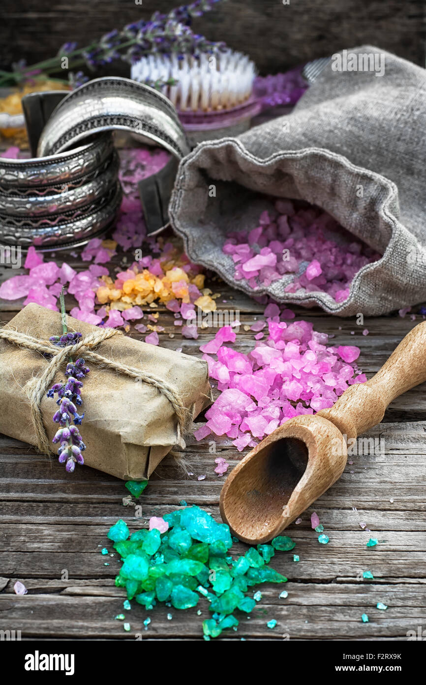 scattered, sea salt Spa treatment on wooden background Stock Photo - Alamy