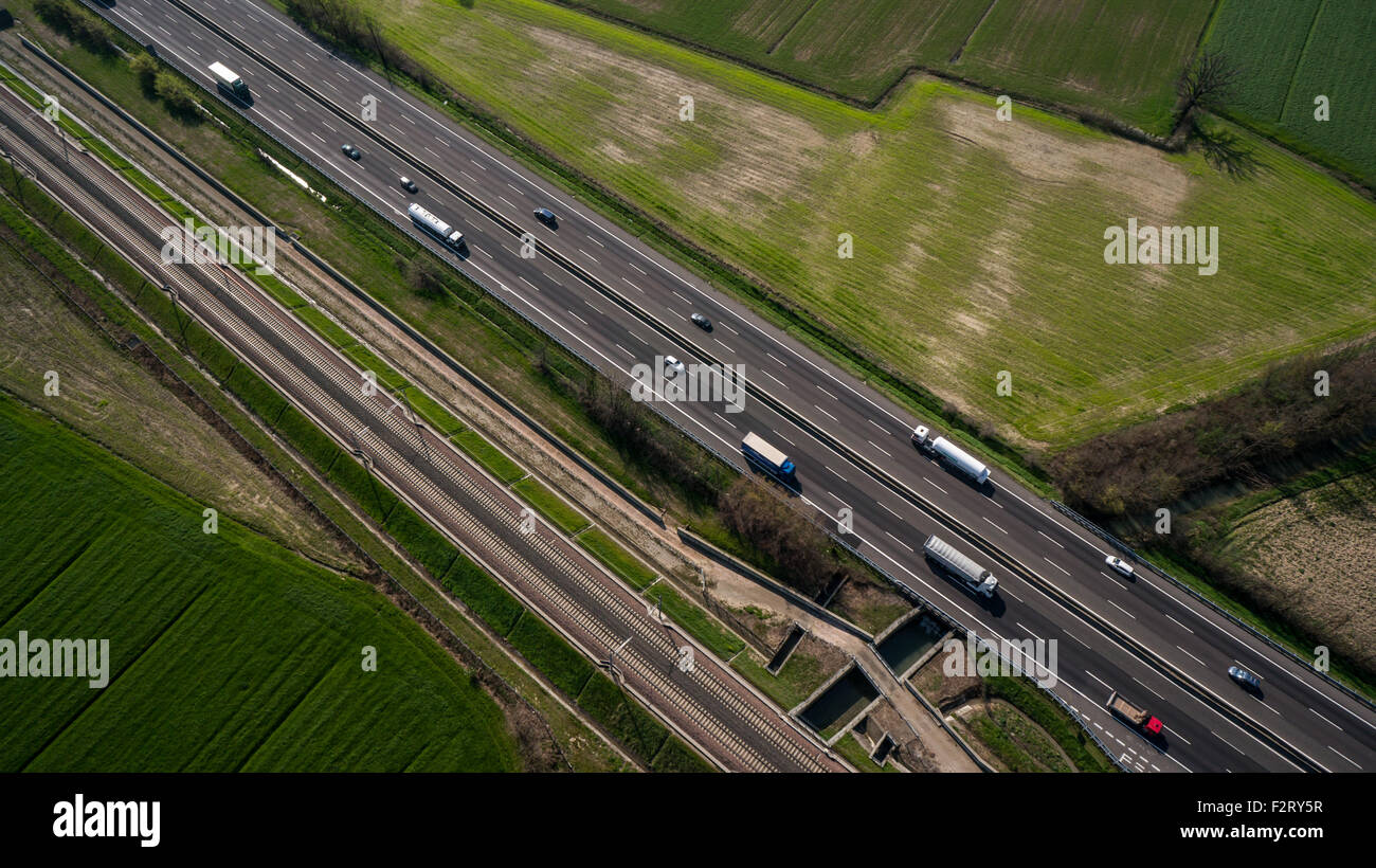 Highway trough rural landscape Stock Photo - Alamy