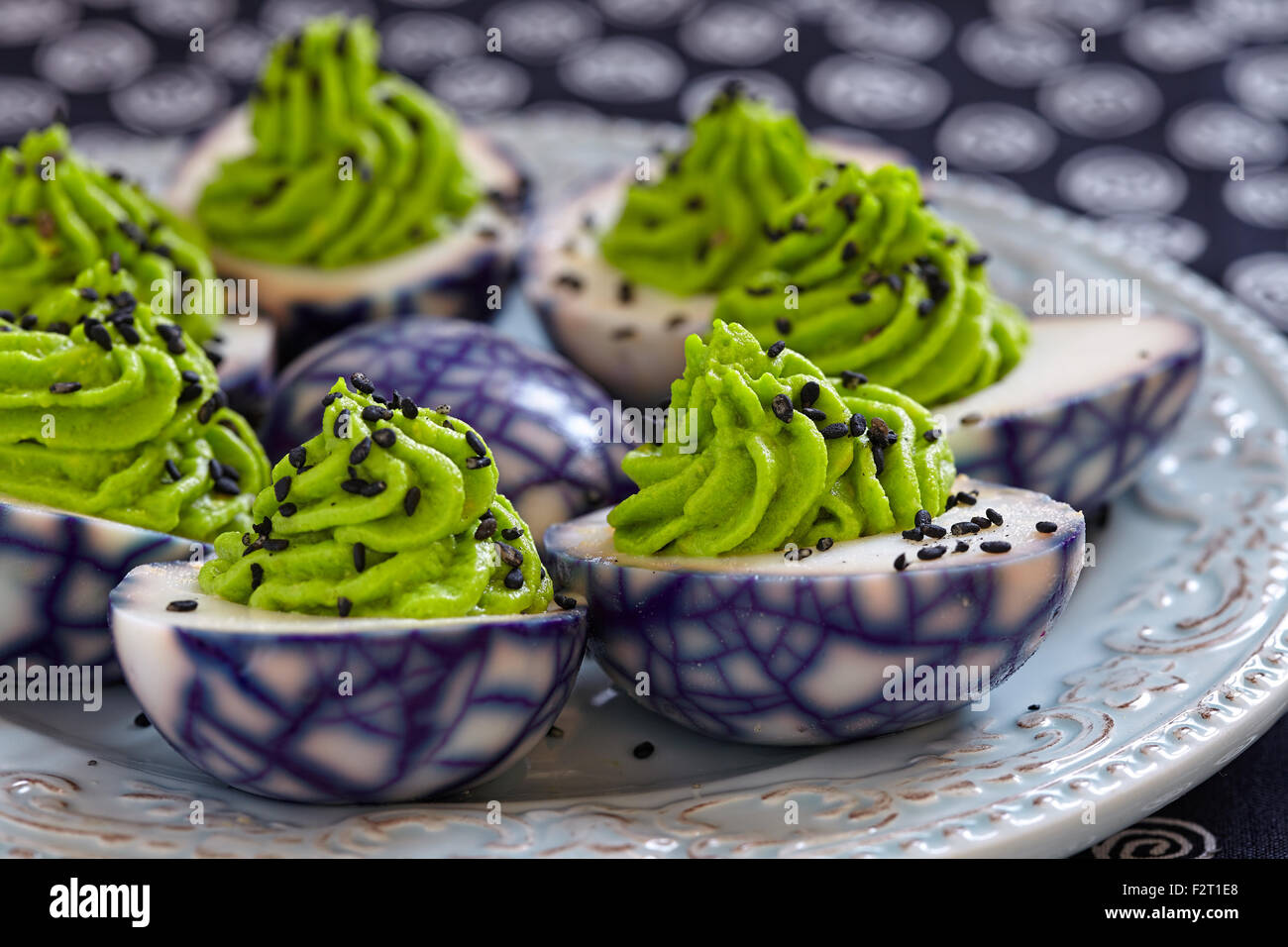 Avocado and Wasabi Deviled Spider web Eggs Stock Photo - Alamy