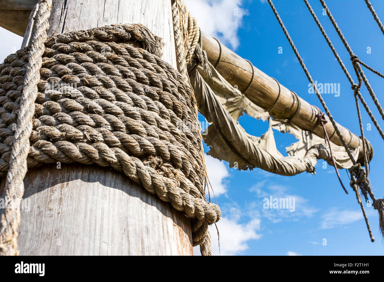Old mast and ragged rigging of a sailing ship Stock Photo - Alamy