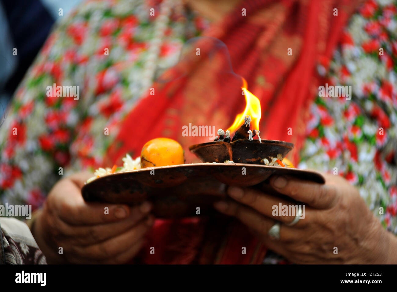 Kathmandu, Nepal. 23rd Sep, 2015. Local devotee lit candles during the ...