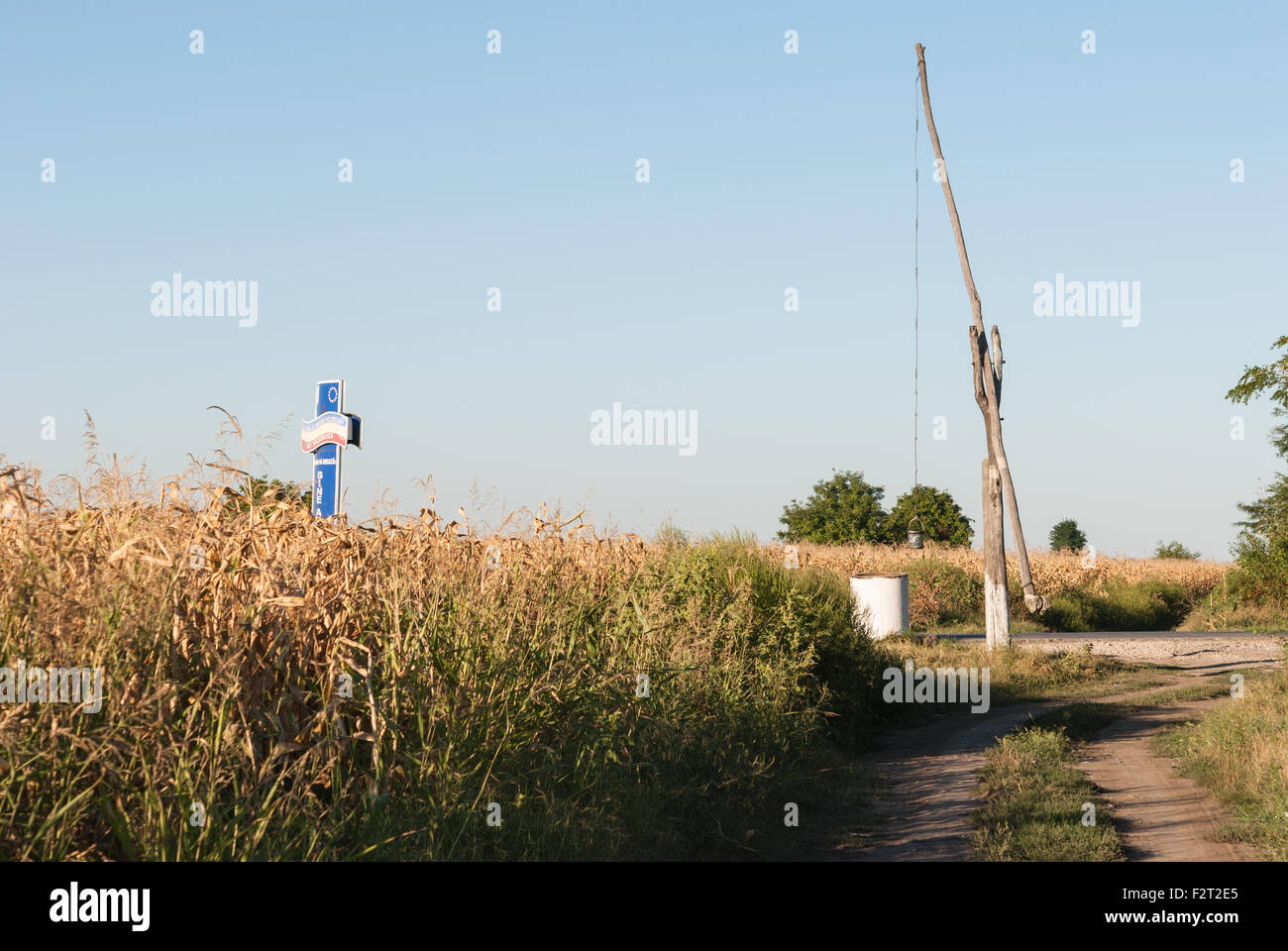 Traditional old wooden shadoof (swape, well pole, well sweep) next to ...