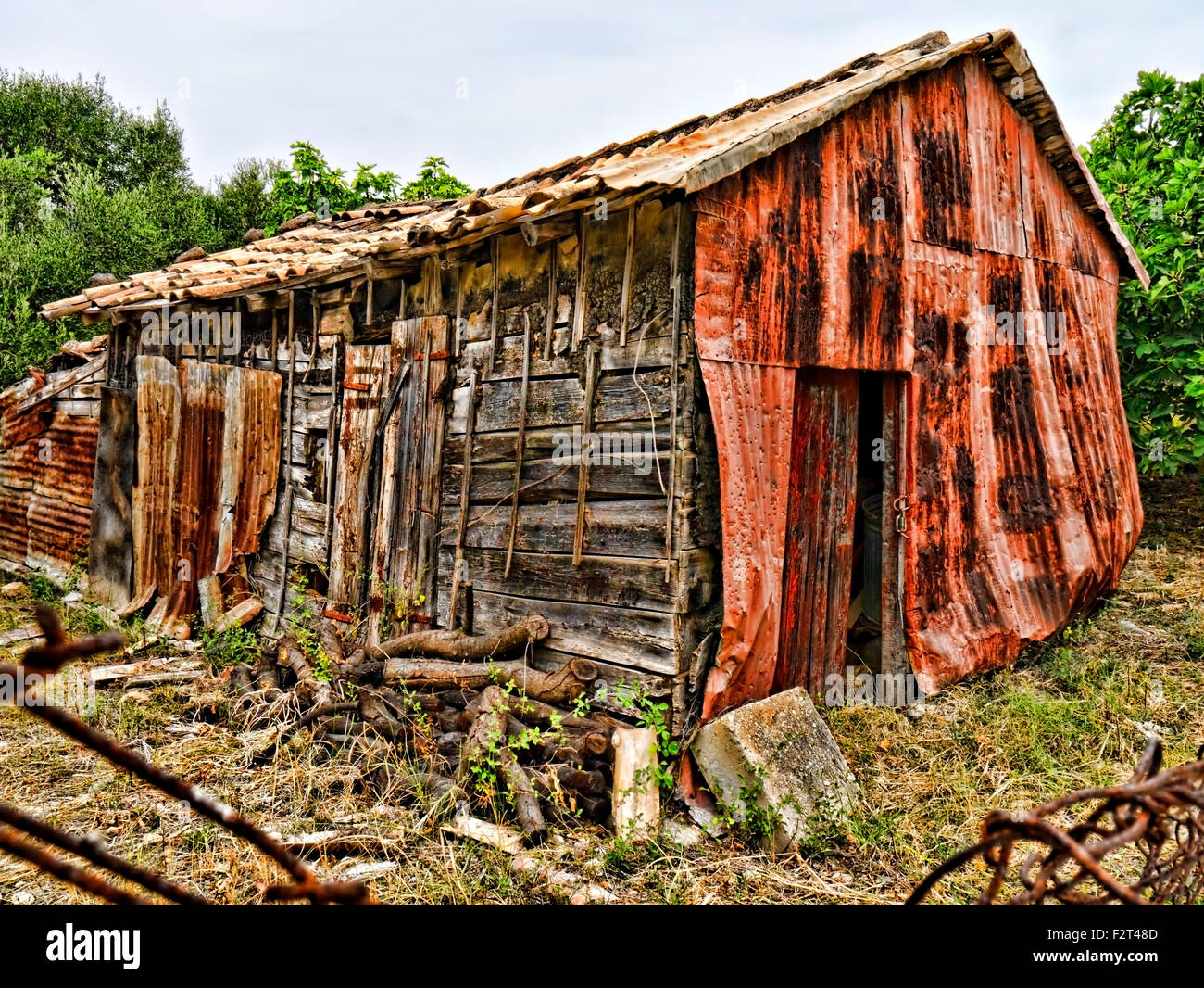 A rustic character full old barn in the fishing village of Katelios on ...