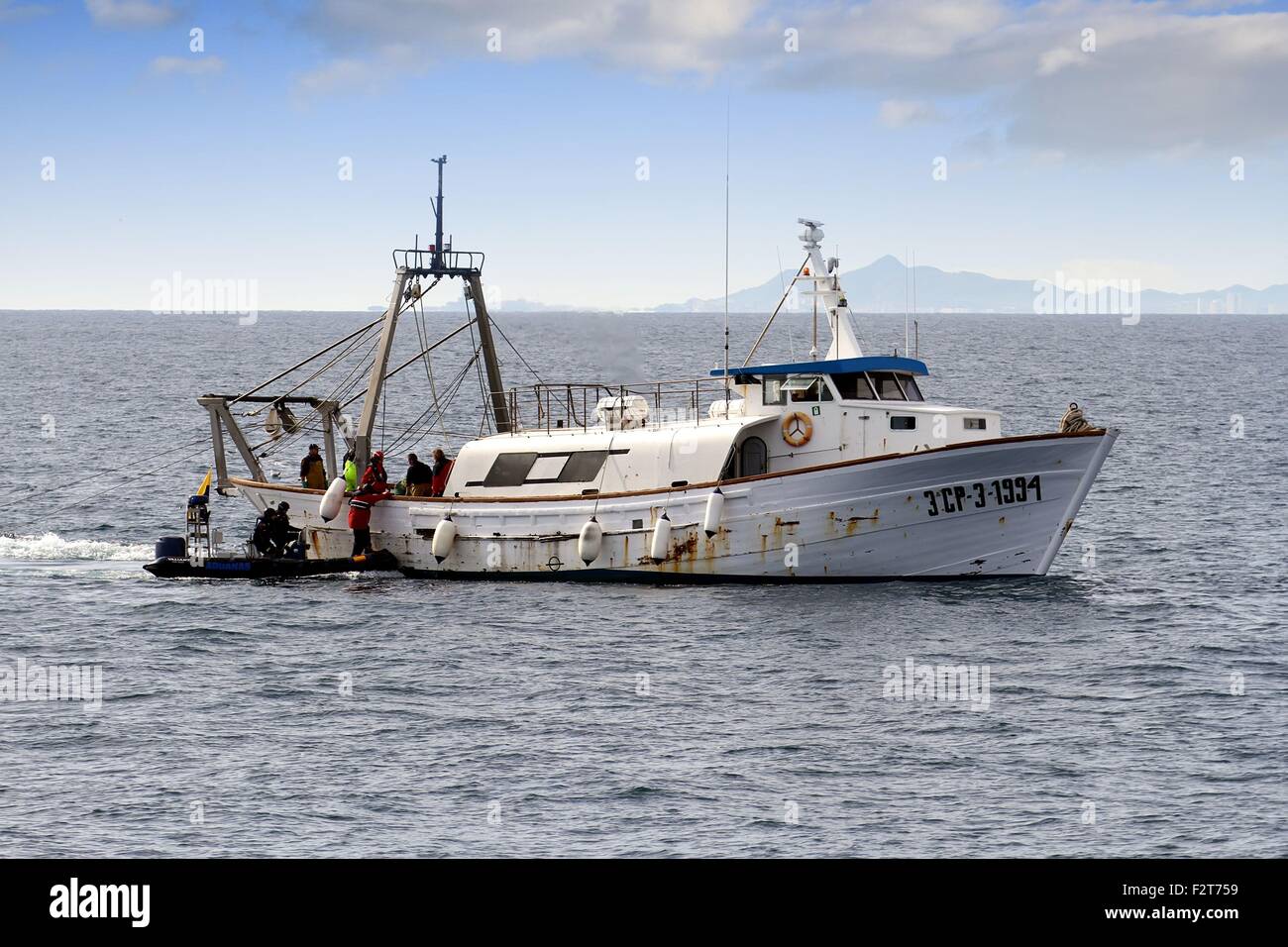 Trawler fishing boat in open waters Stock Photo - Alamy