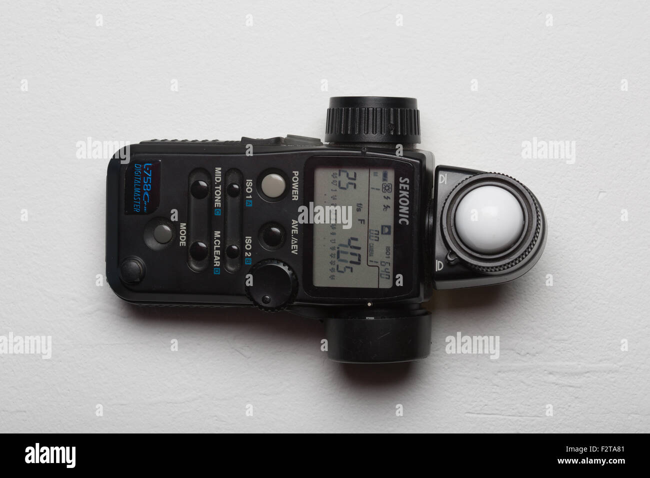close up shot of photography light meter on a white background Stock ...