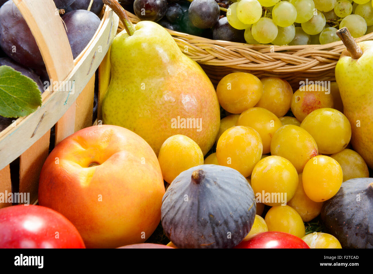 different seasonal fruits, plums, pears, grapes Stock Photo - Alamy