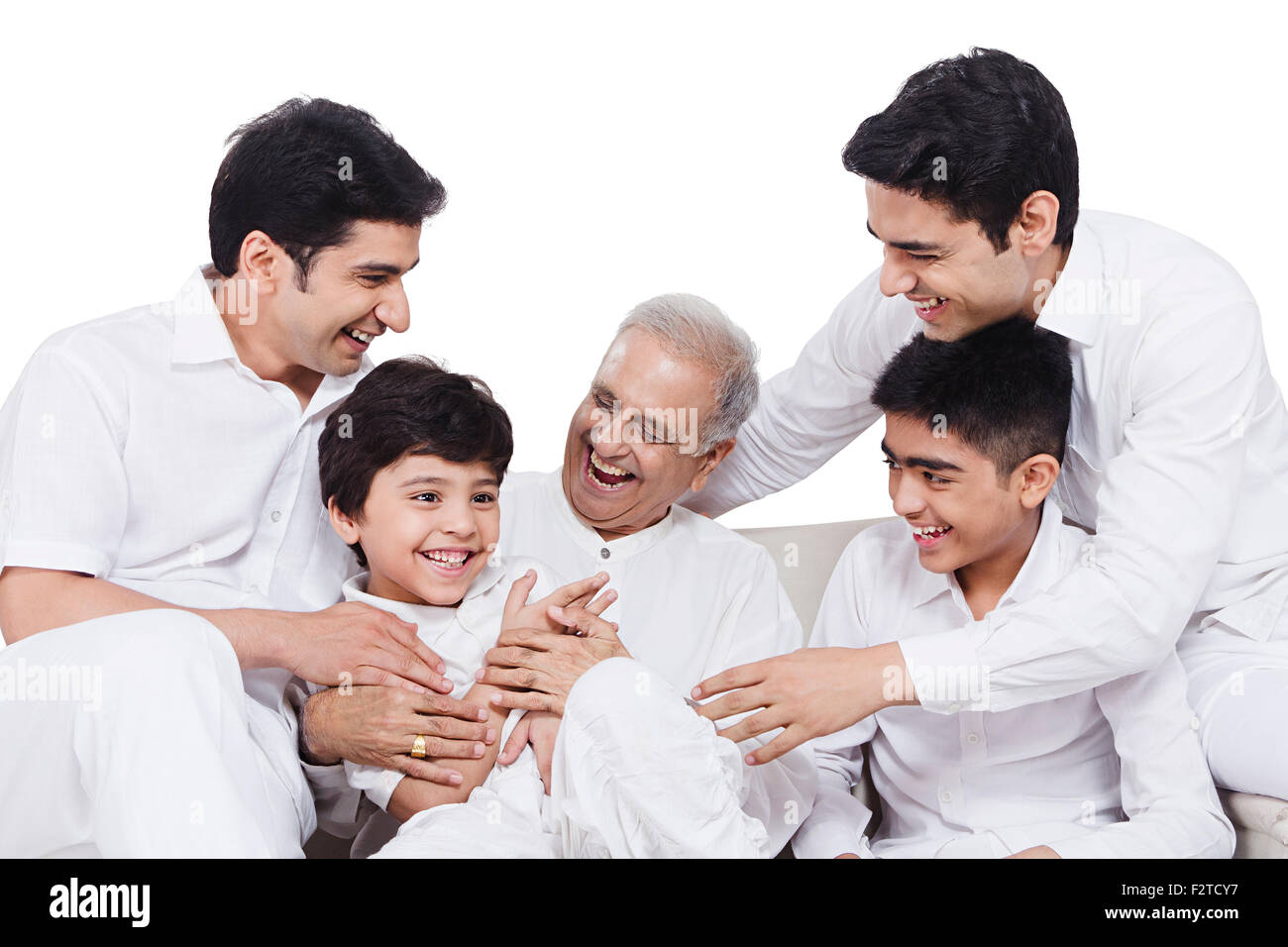 indian group Family Parents Sitting Sofa enjoy Stock Photo - Alamy