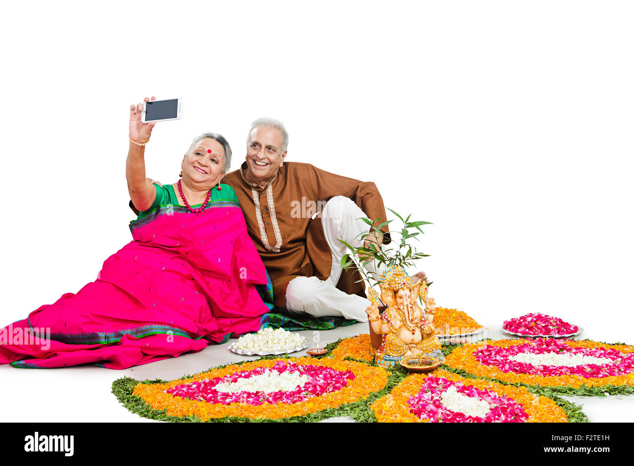 Senior indian woman sit on the floor hi-res stock photography and ...
