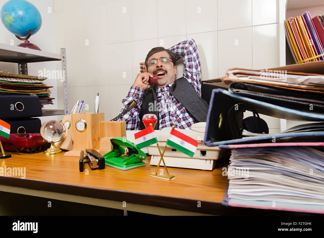 1 indian Man Government Employee office sitting talking Telephone Stock ...