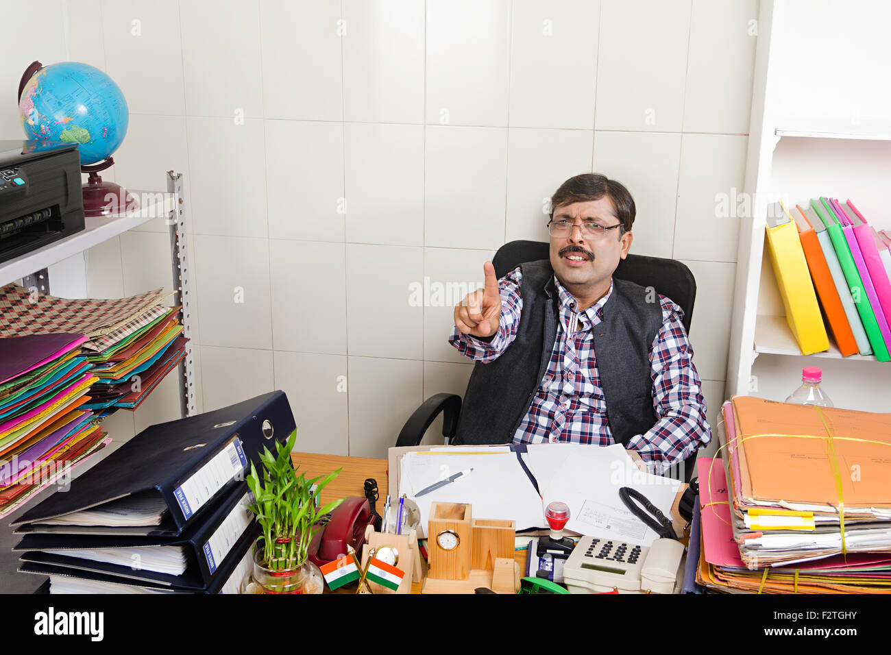 1 indian Man Government Employee office working finger Pointing Stock ...