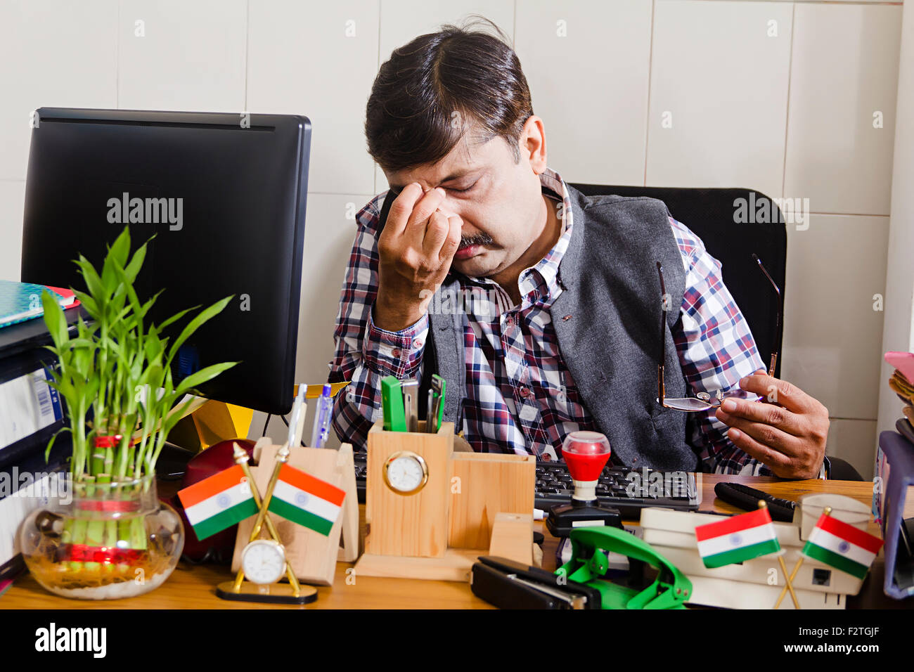 1 indian Man Government Employee office working Problem Stock Photo - Alamy