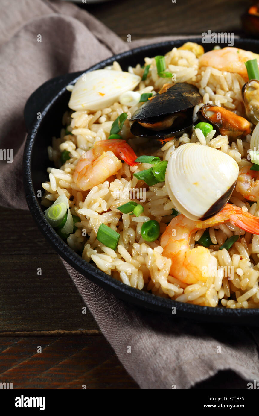Fried rice with mussels and seafood, food Stock Photo - Alamy