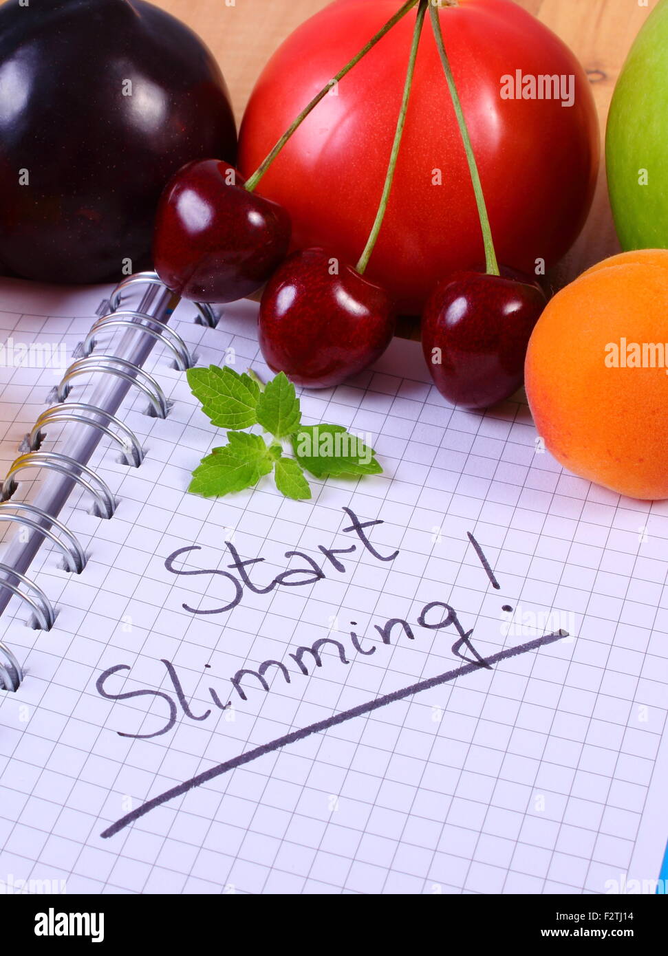 Fresh fruits and vegetables with notebook for writing notes, concept of ...