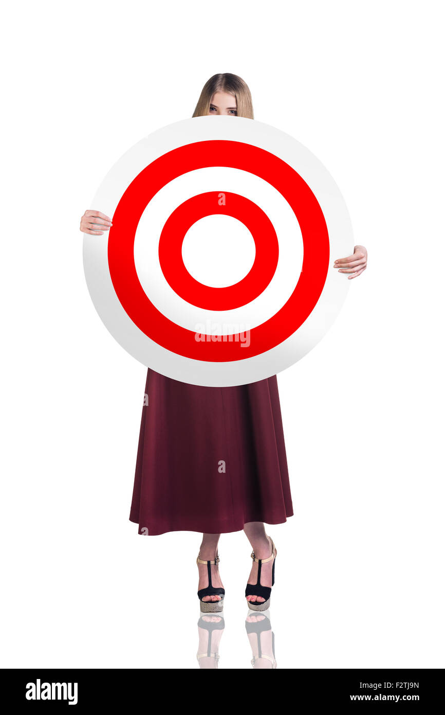 Business woman holding big target Stock Photo - Alamy