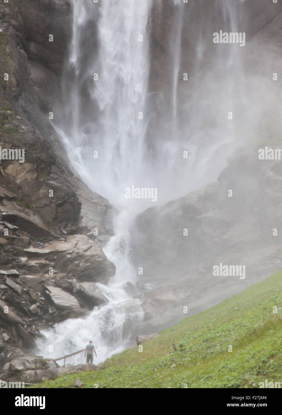 Man under waterfall hi-res stock photography and images - Alamy