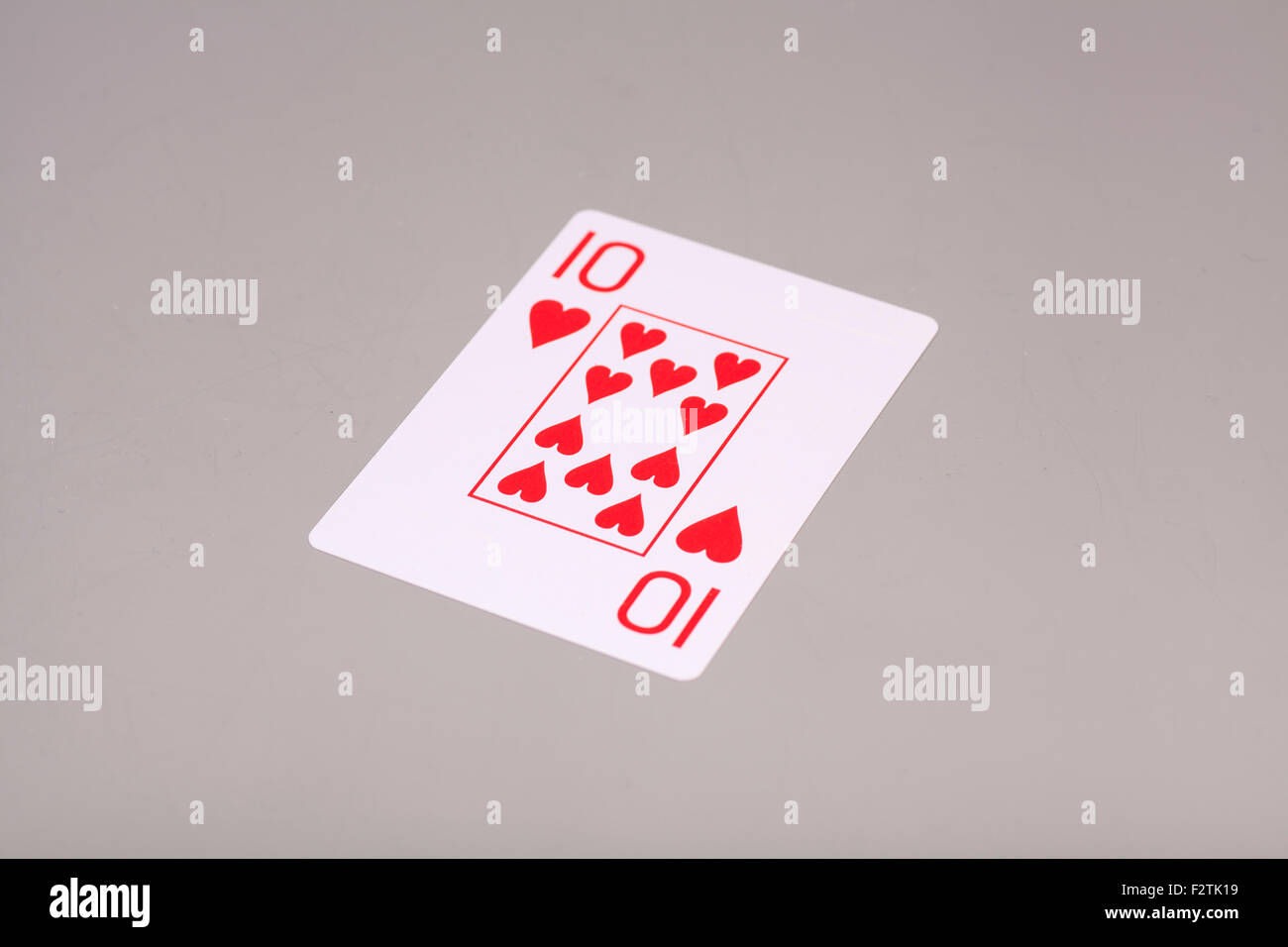 Ten of hearts playing card, isolated on gray background Stock Photo - Alamy