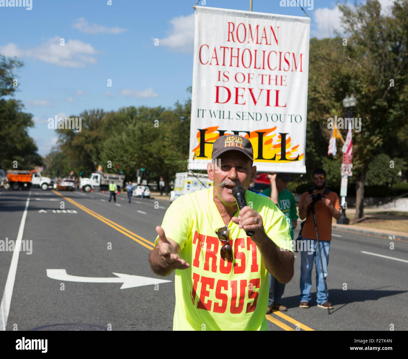 A man demonstrates with anti-Catholic slogans near The White House in ...