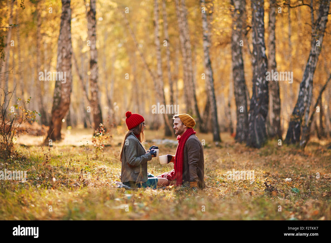 Restful couple drinking tea at leisure in park Stock Photo - Alamy