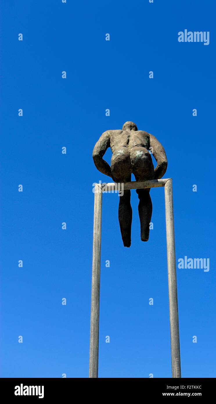 Man climbing statue hi-res stock photography and images - Alamy