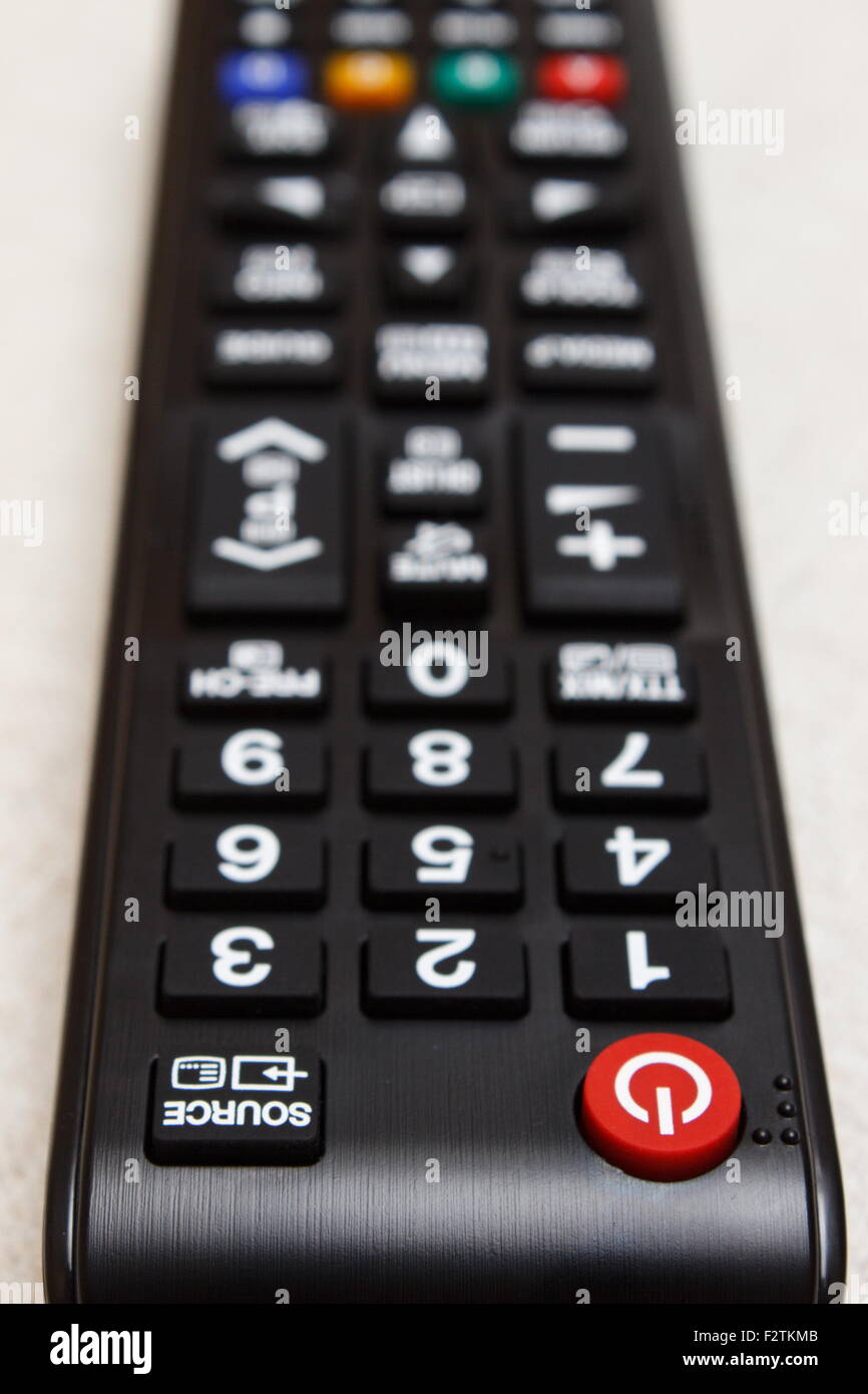 Buttons on infrared remote control for television Stock Photo - Alamy