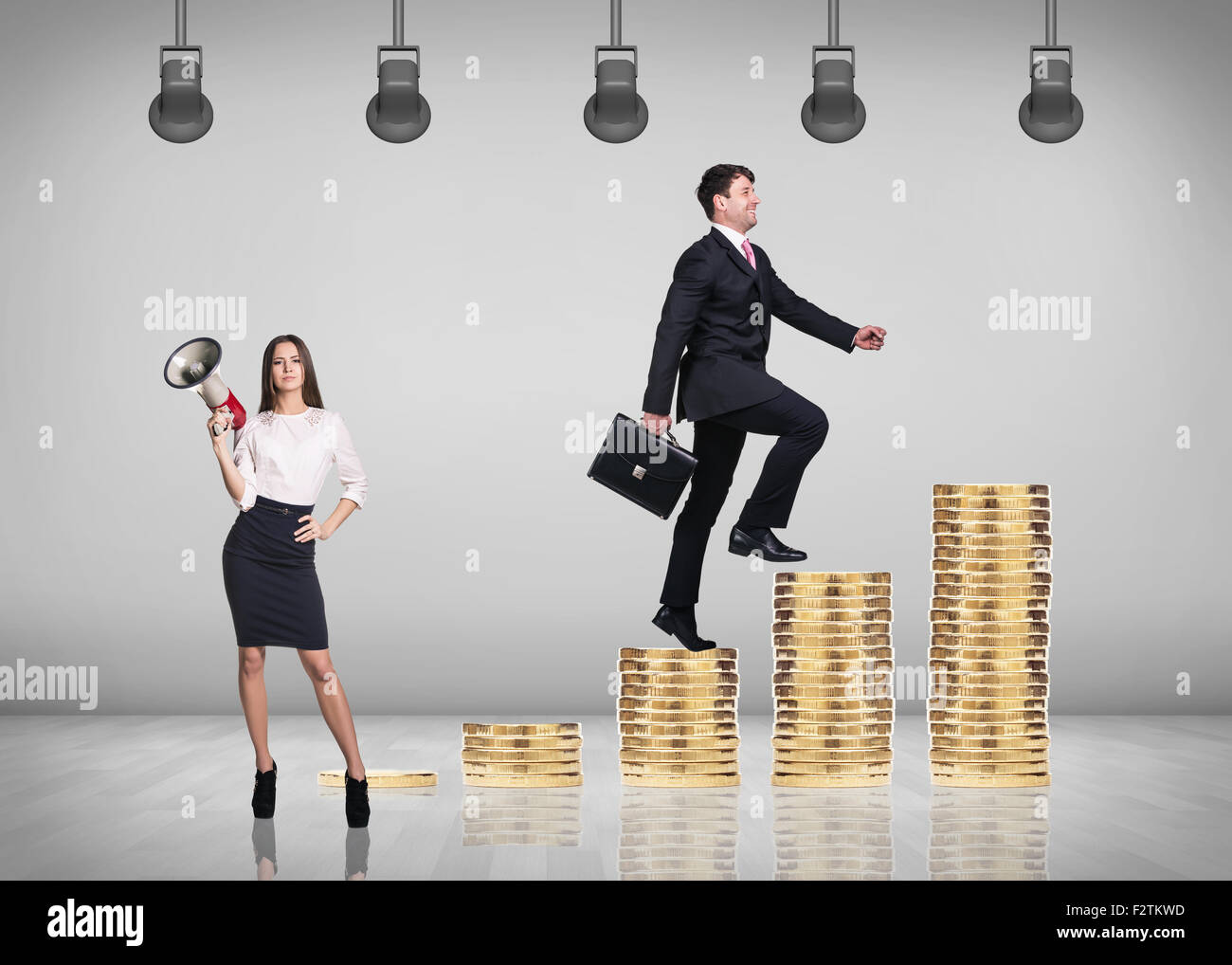 Man goes up by stairs from coins Stock Photo - Alamy