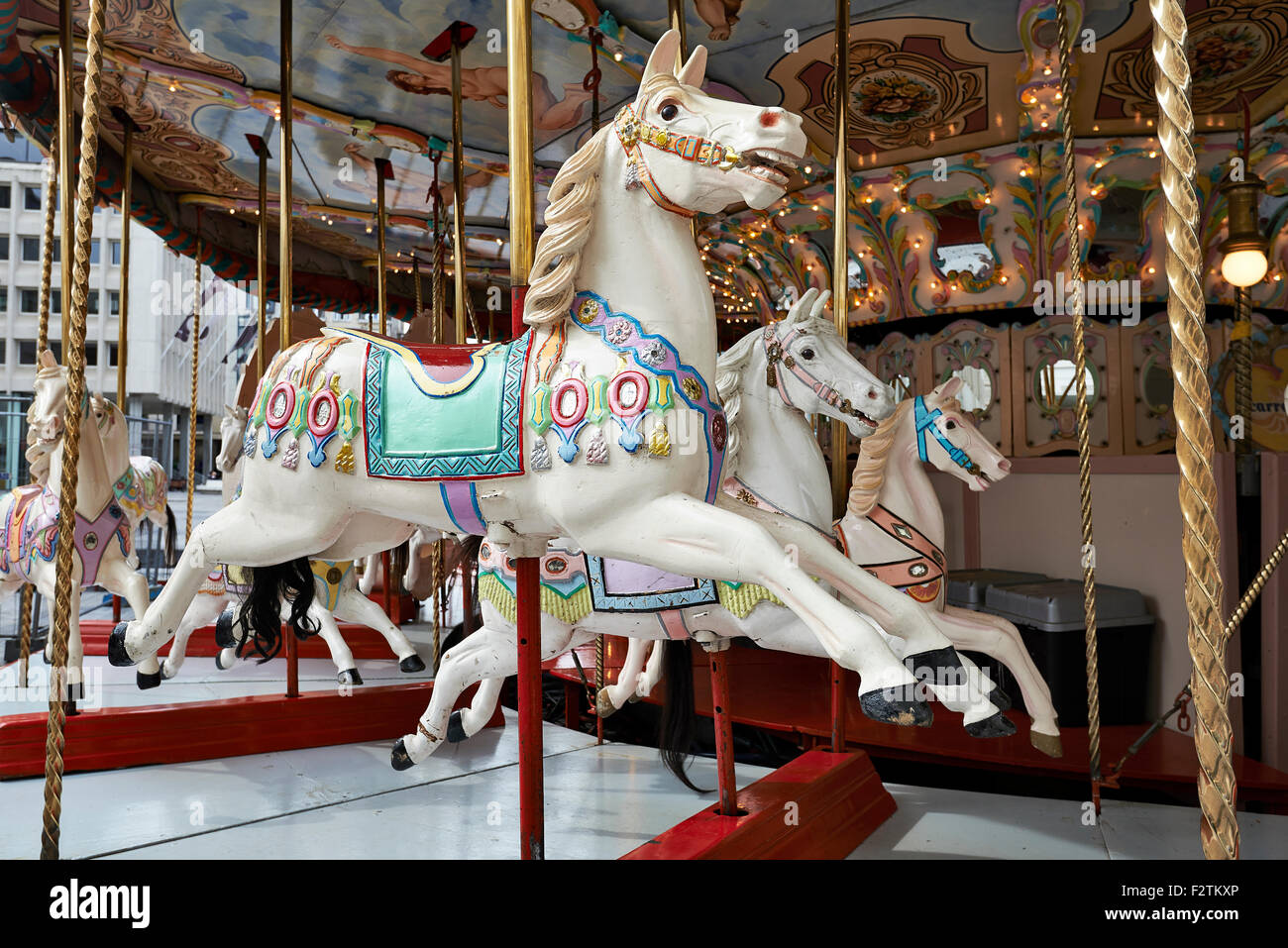 Classic carousel horse, Focus on three horses Stock Photo - Alamy