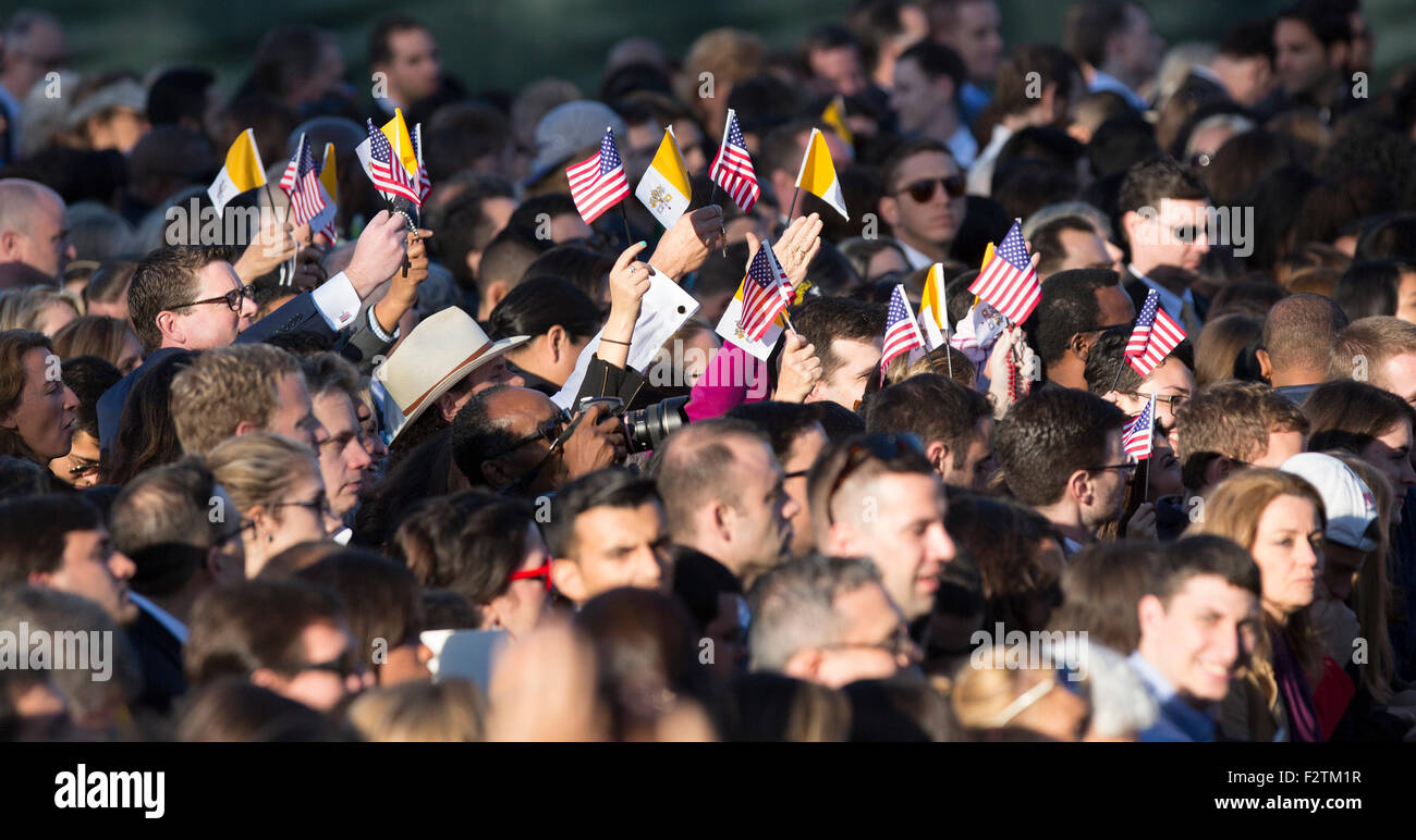 Guests hold US and Papal flags as United States President Barack Obama ...