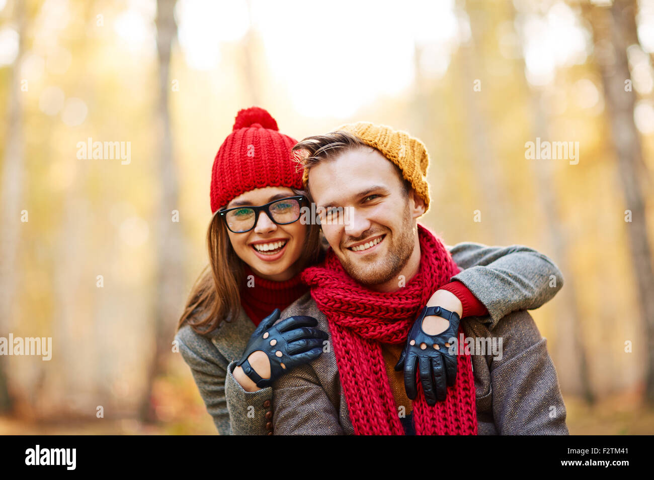 Cute dates looking at camera while relaxing in park Stock Photo - Alamy