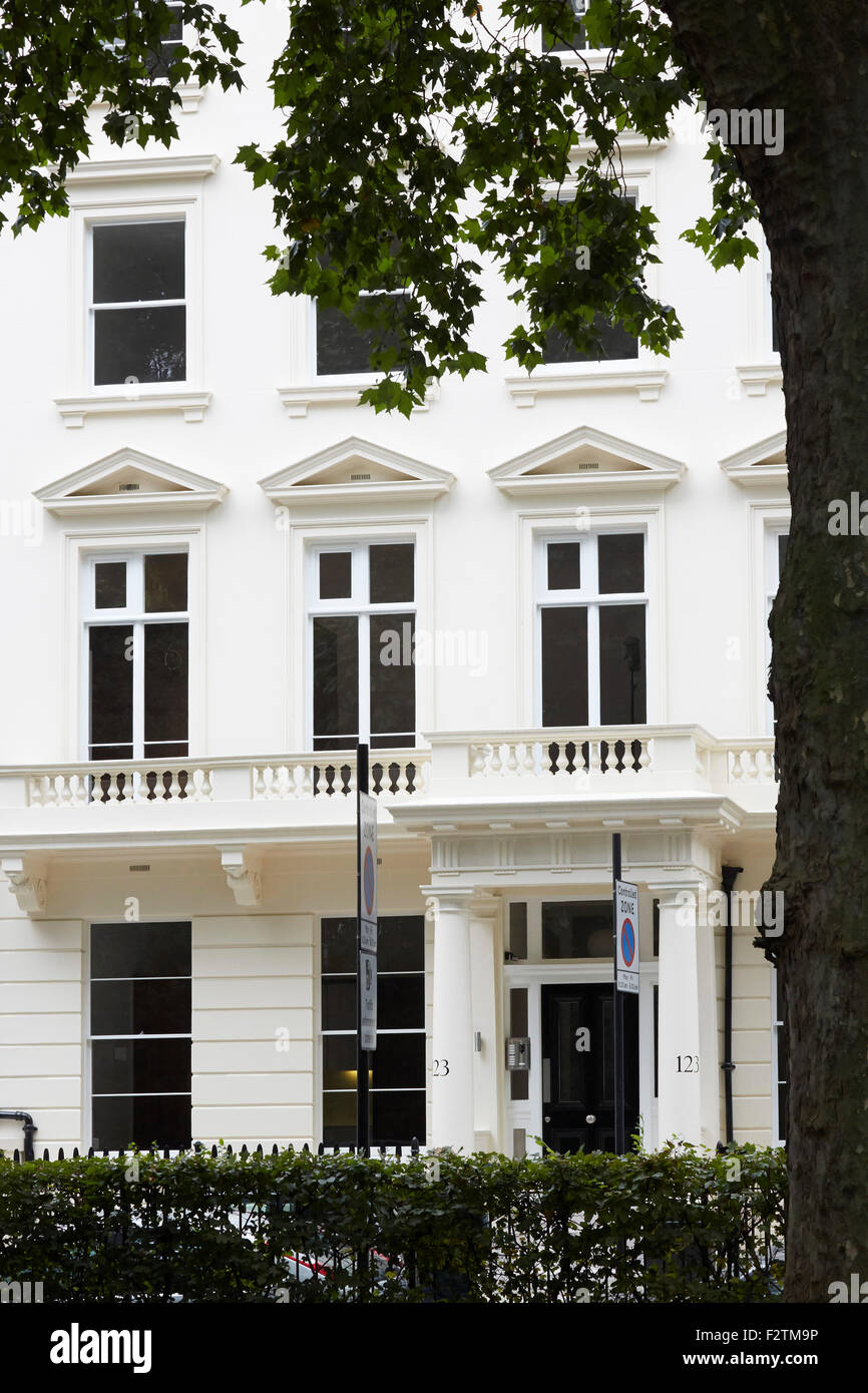 Exterior facade detail from park. St George's Square, London, United ...