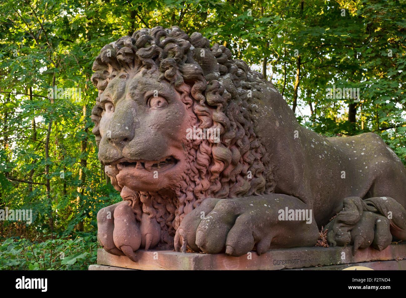 Stone lion at the gateway to Castle Lowenstein, Kleinheubach, Lower ...