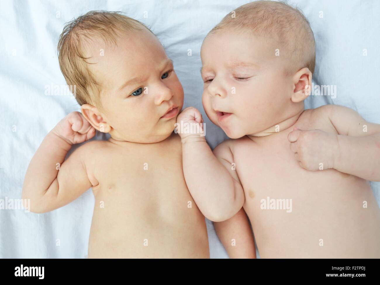 Portrait of a two little baby Stock Photo - Alamy