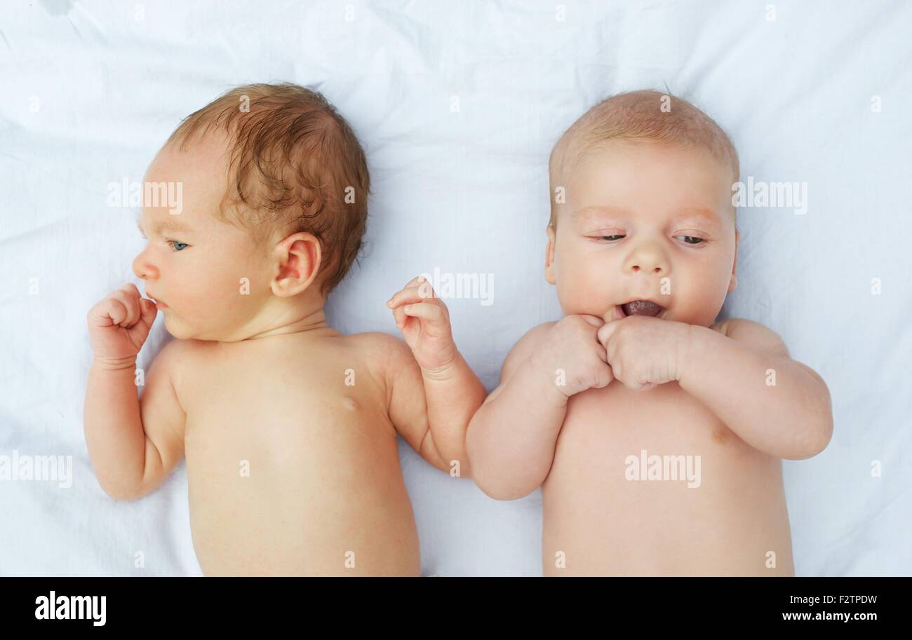 Portrait of a two little baby Stock Photo - Alamy