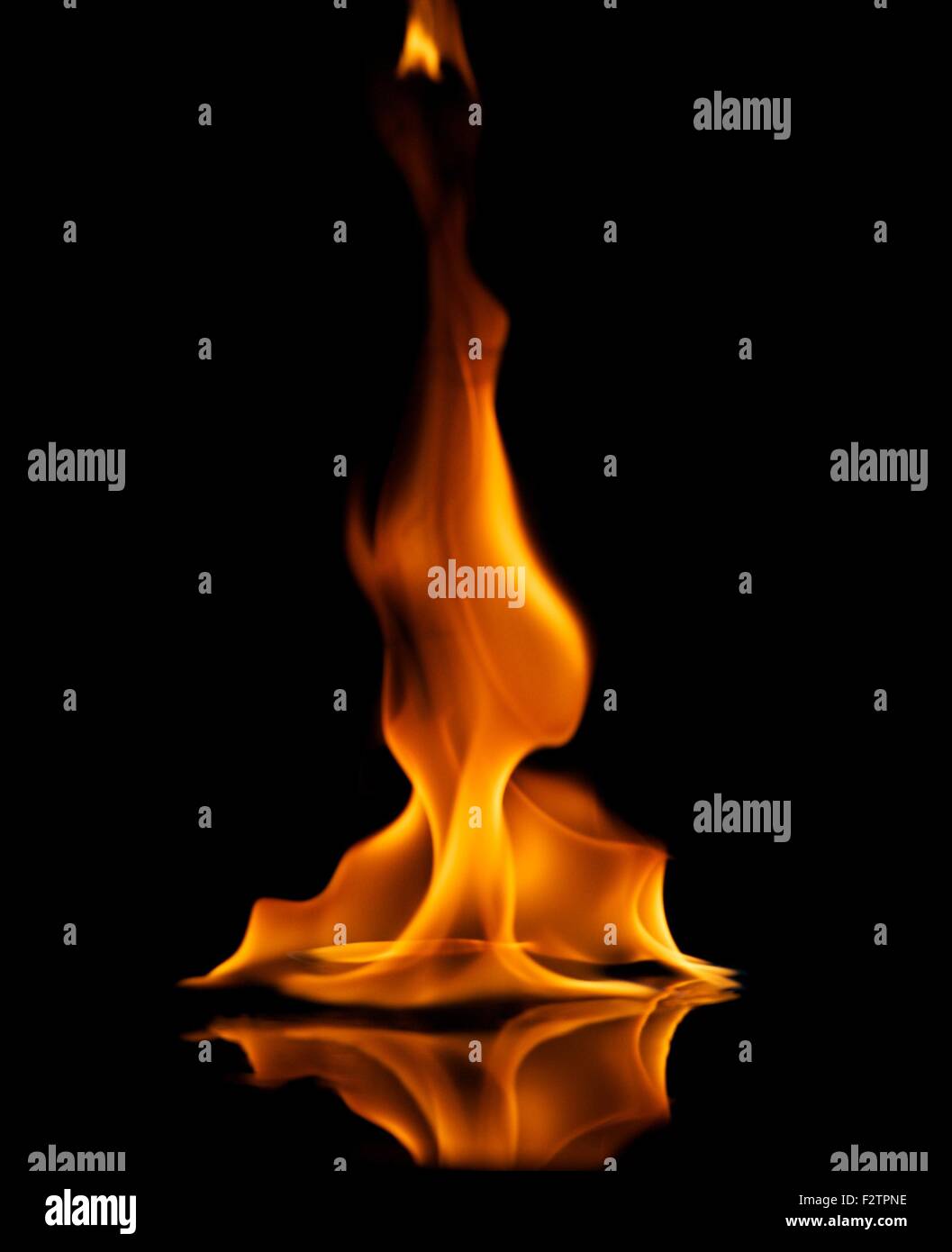 Fire flames reflected in water Stock Photo - Alamy