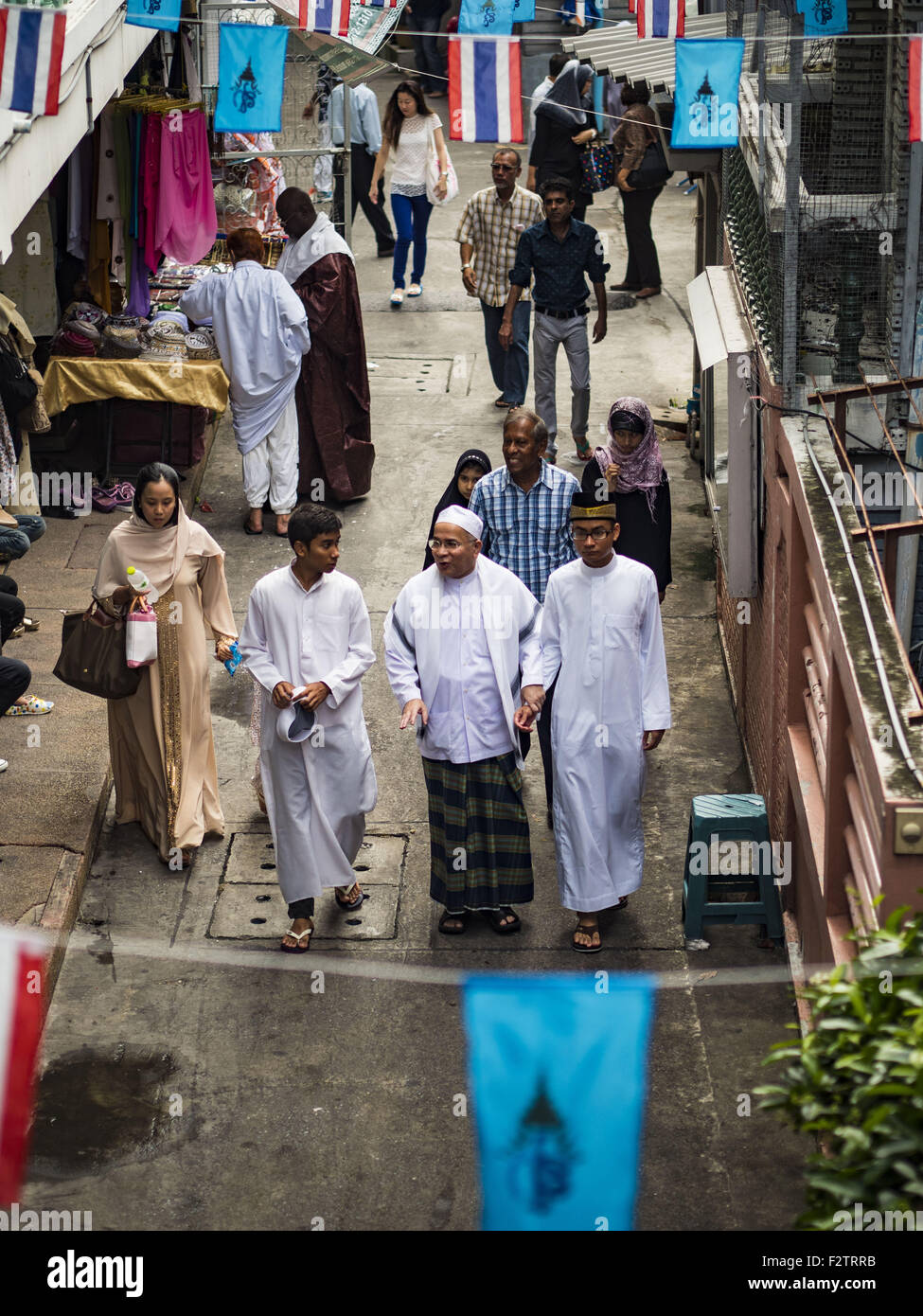 Bangkok, Thailand. 24th Sep, 2015. People walk into Haroon Mosque ...