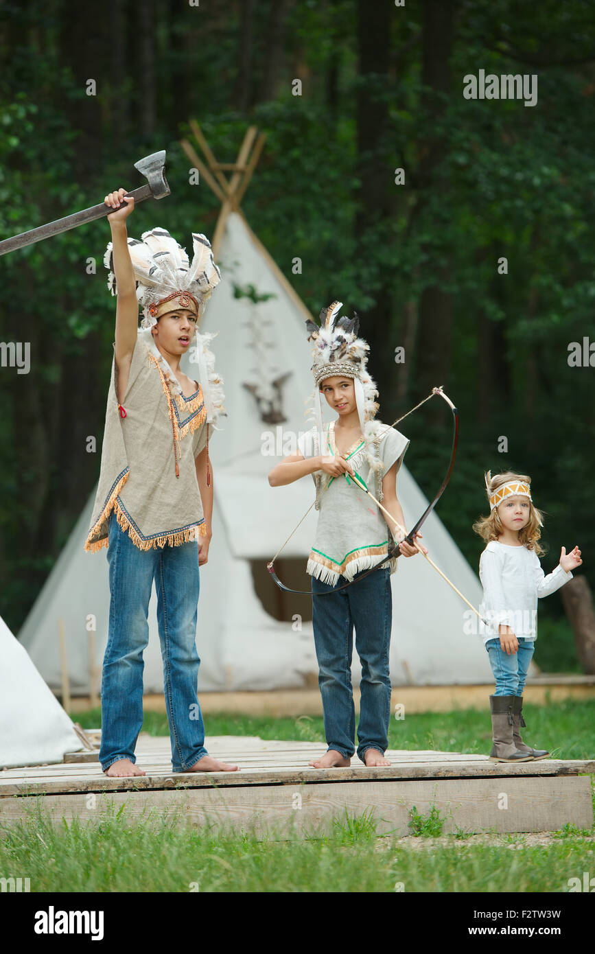 happy children with native american costumes Stock Photo - Alamy