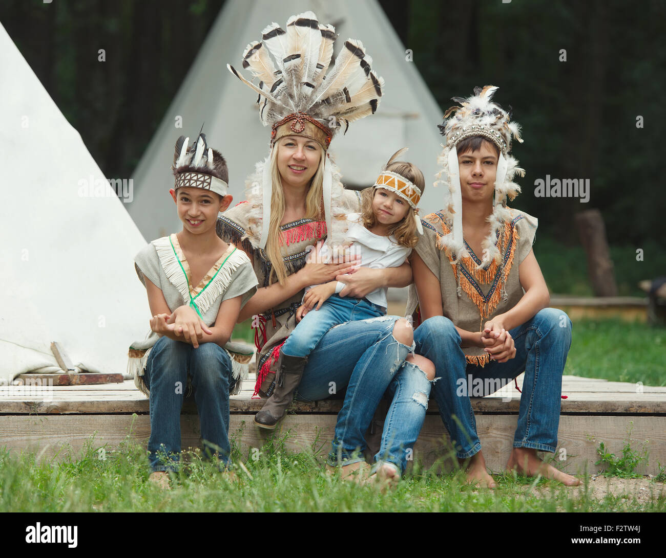 happy children with native american costumes Stock Photo - Alamy