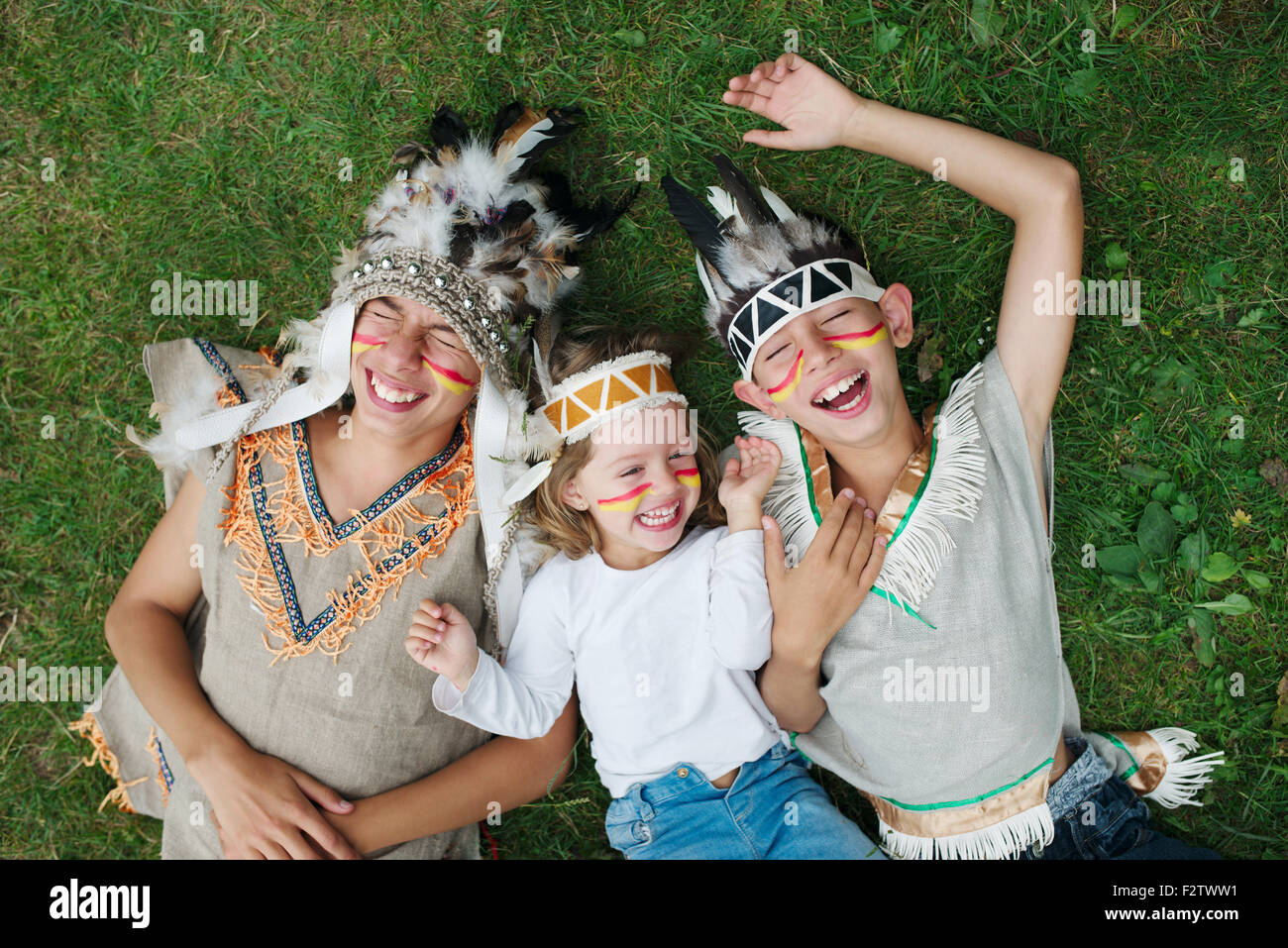 happy children with native american costumes Stock Photo - Alamy