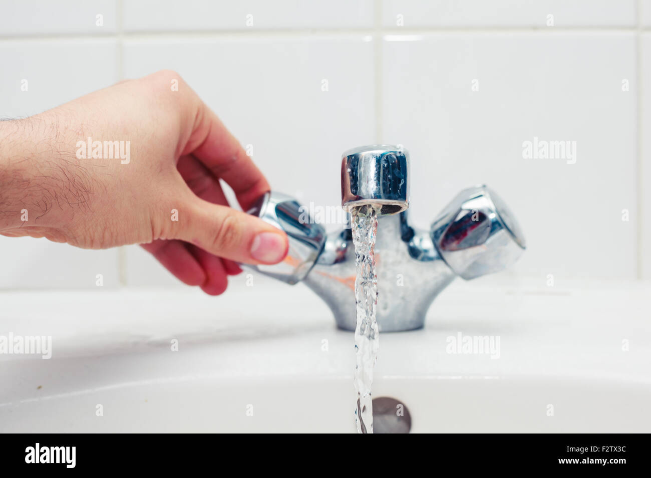 Hand tap hi-res stock photography and images - Alamy