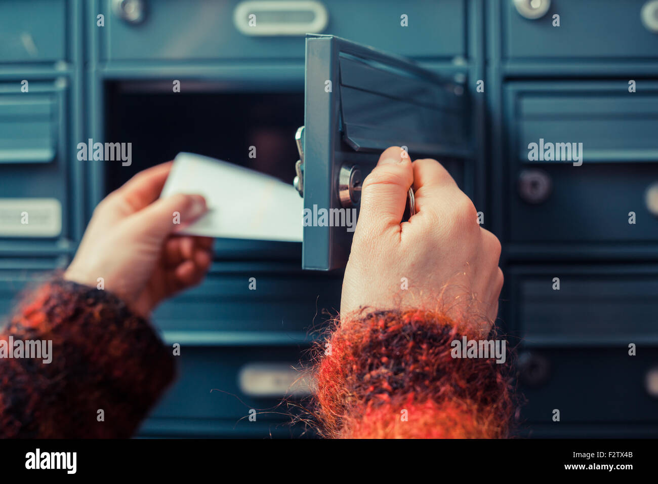 Hand out envelope hi-res stock photography and images - Alamy