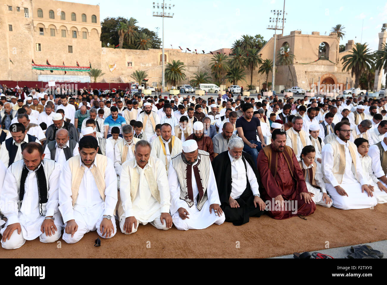 Tripoli, Libya. 24th Sep, 2015. Muslims offer prayers during the Eid al ...
