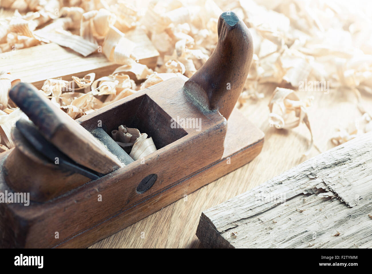 Old wooden hand plane for woodworking and carpentry Stock Photo - Alamy