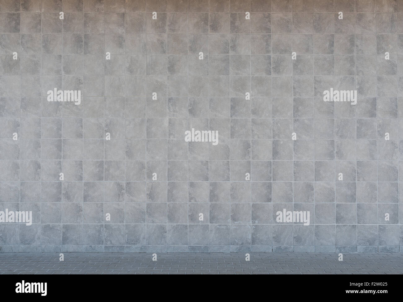 Urban background. Tiled empty street wall and pavement Stock Photo - Alamy