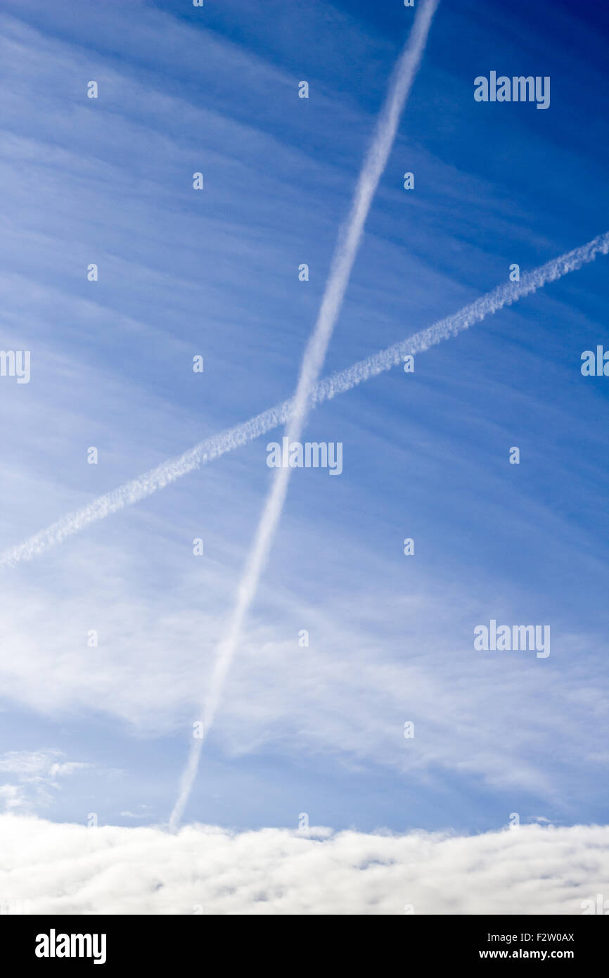 14.04.2015, Berlin, Berlin, Germany - Contrails crossing each other in ...
